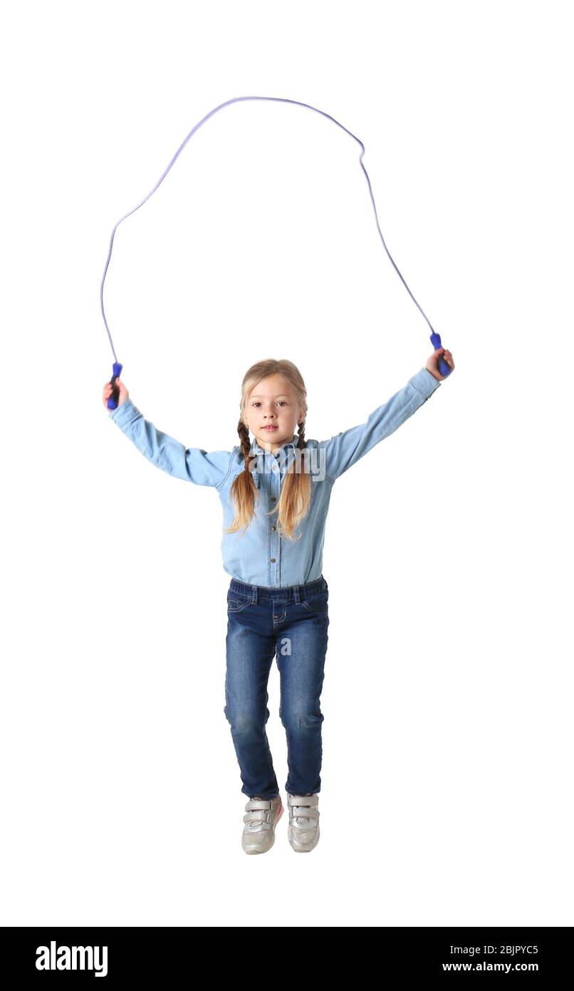 Cute little girl playing with jumping rope on white background Stock ...