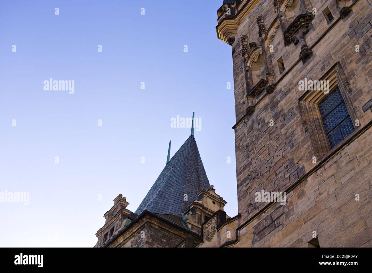 View of the spire of the tower of a medieval building in Prague (Czech ...
