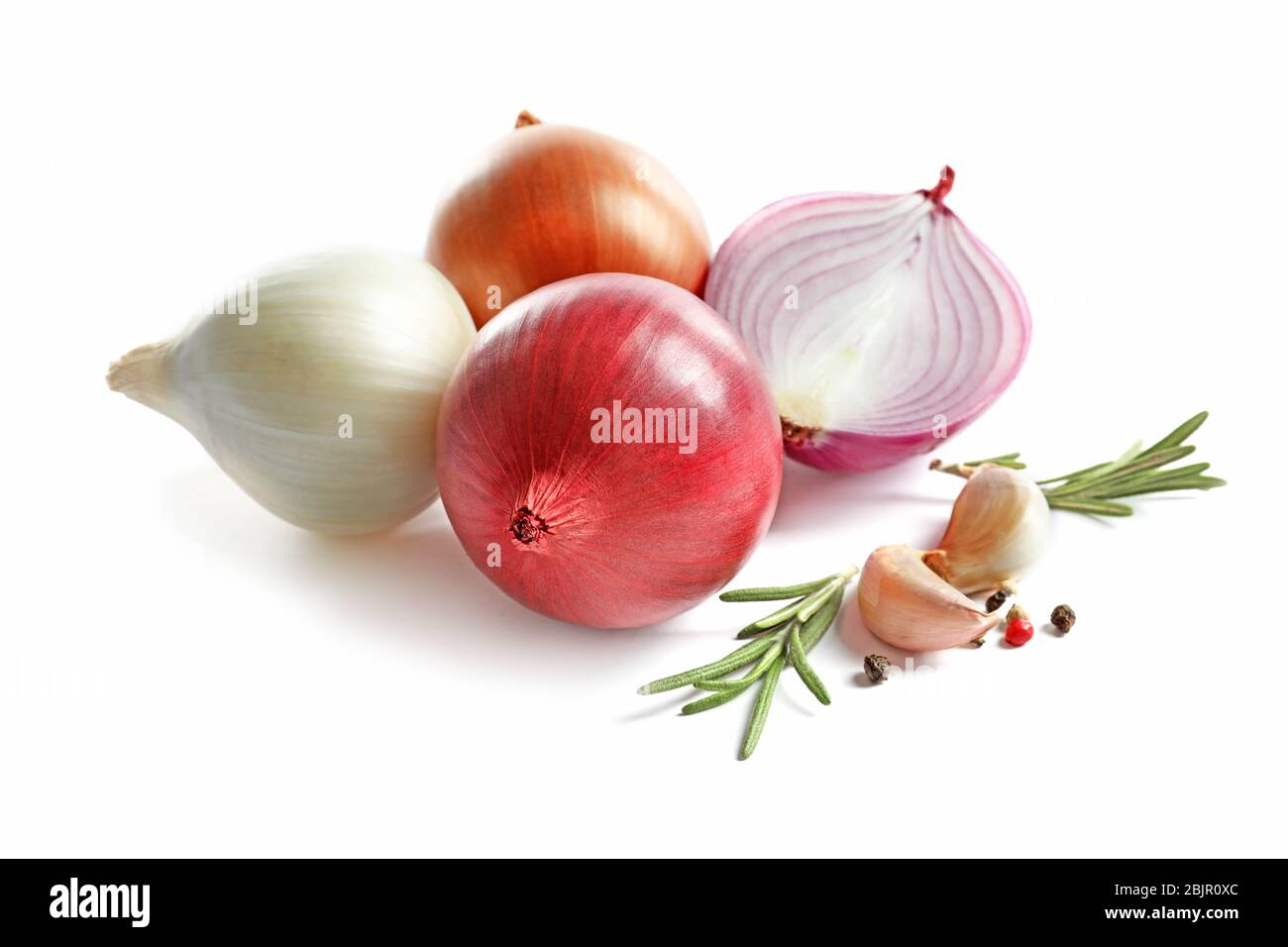 Variety of different onions on white background Stock Photo - Alamy