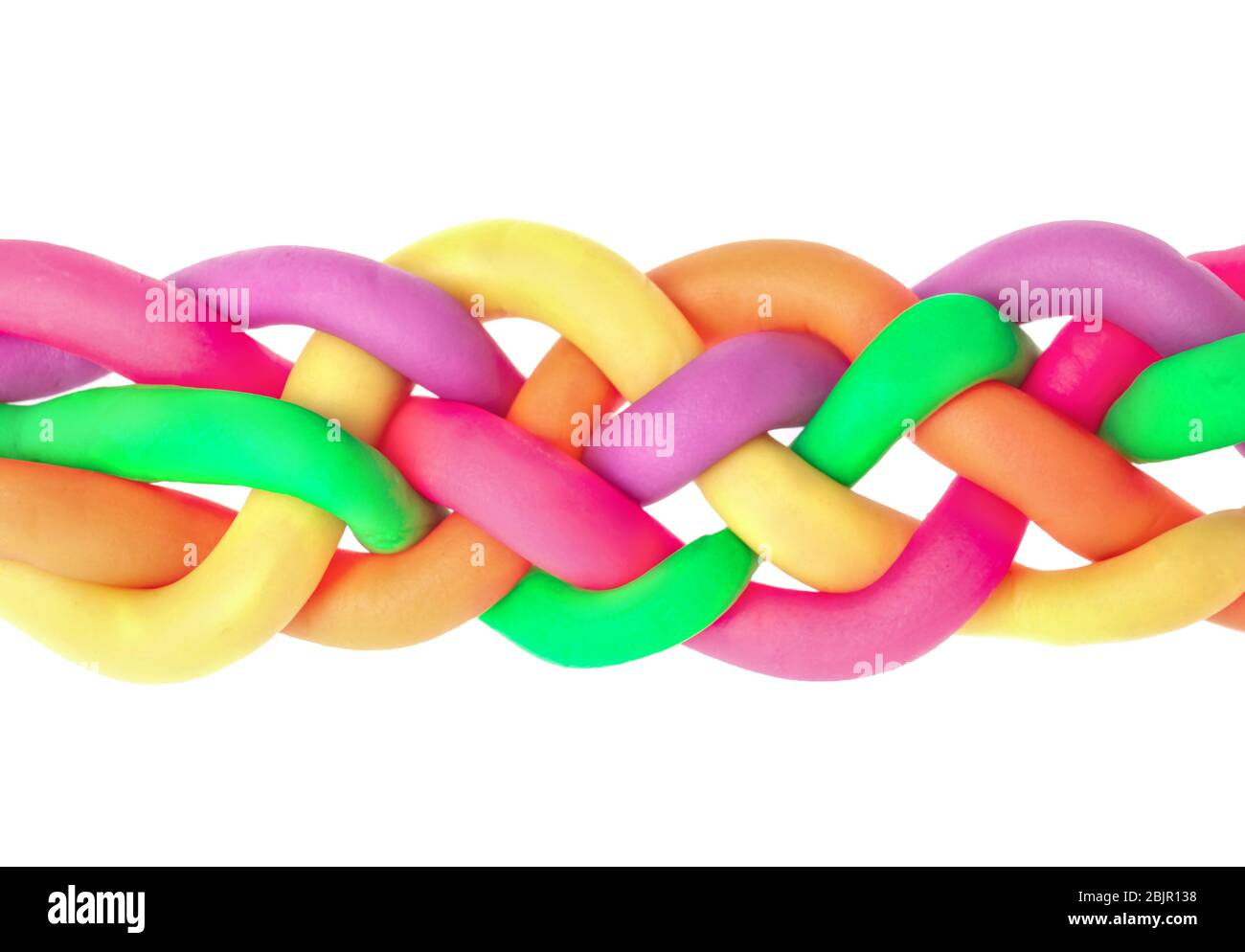Plasticine braid on white background Stock Photo - Alamy
