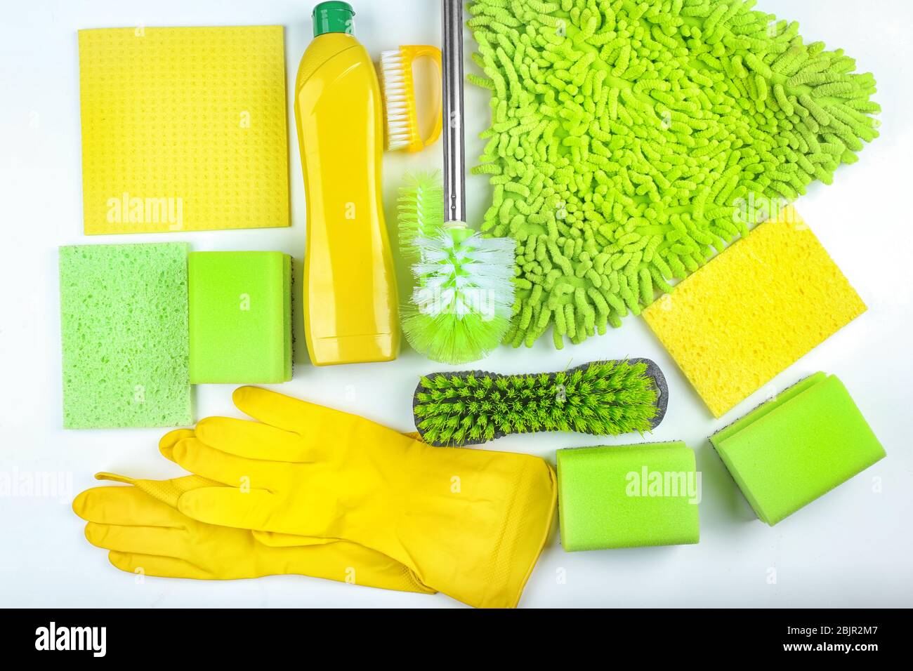 Cleaning supplies on white background Stock Photo - Alamy