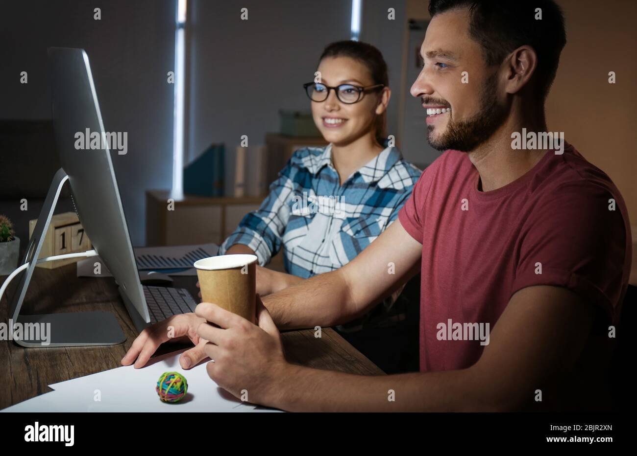 Female office workers using glass hi-res stock photography and images ...