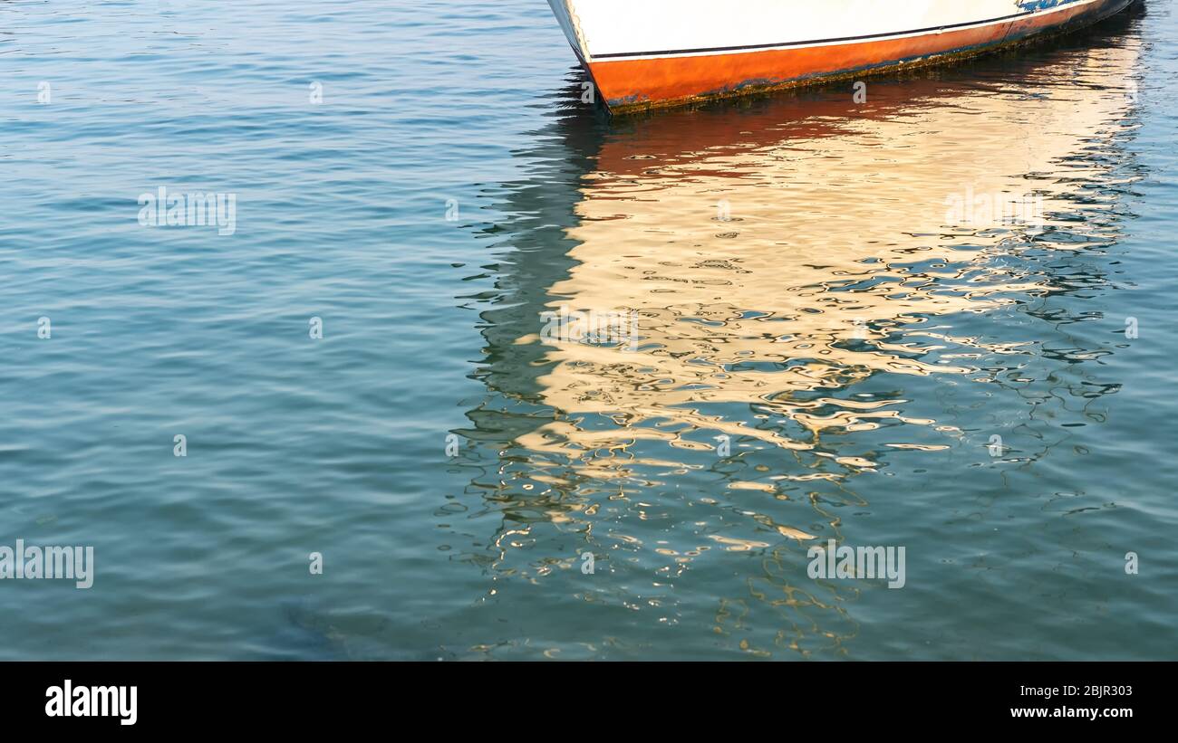 Water reflection of the local fisherman boat mooring at Local fisherman ...