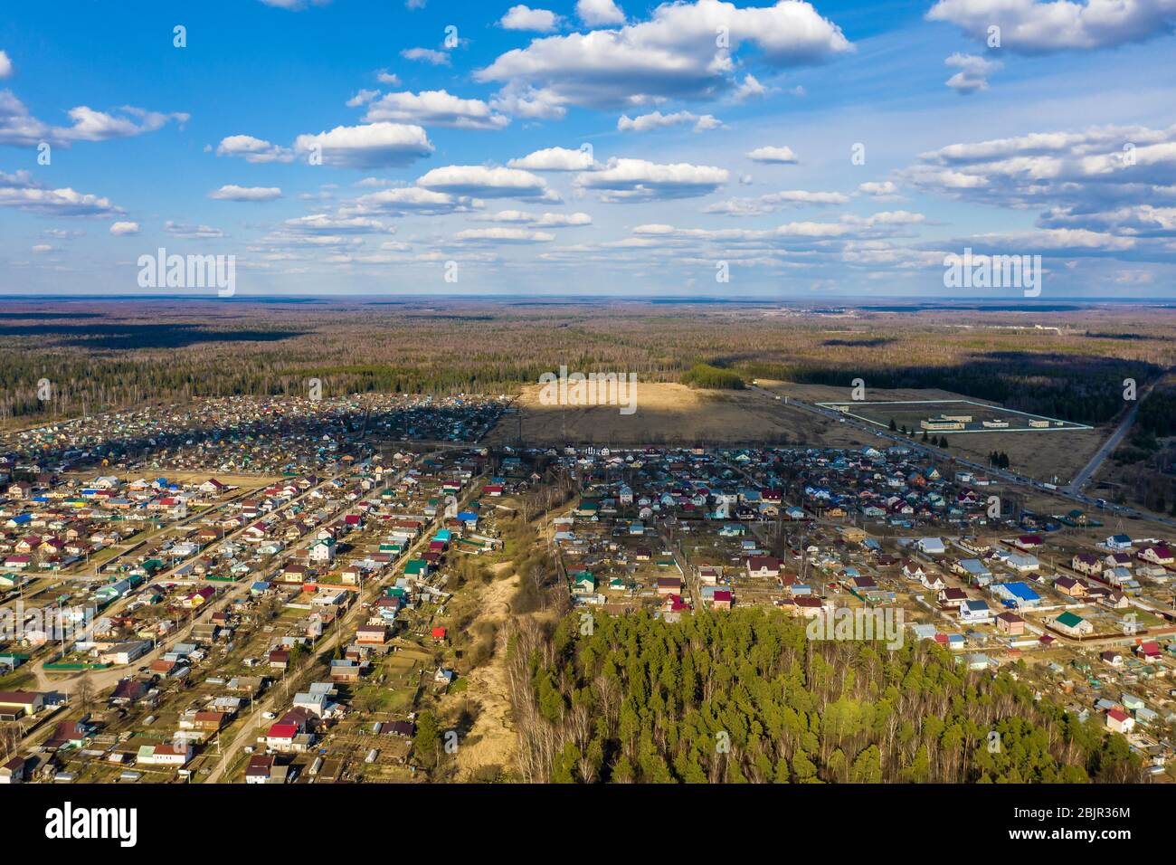 A panorama of Gorino village from a bird's flight on a spring sunny day ...