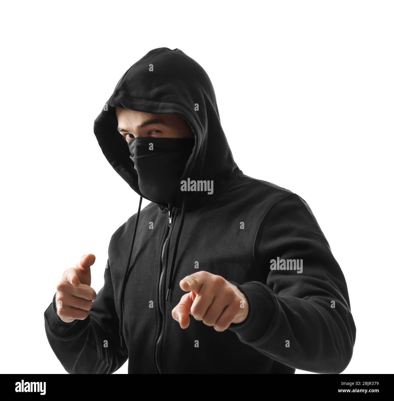 Hacker in mask white background Stock Photo - Alamy