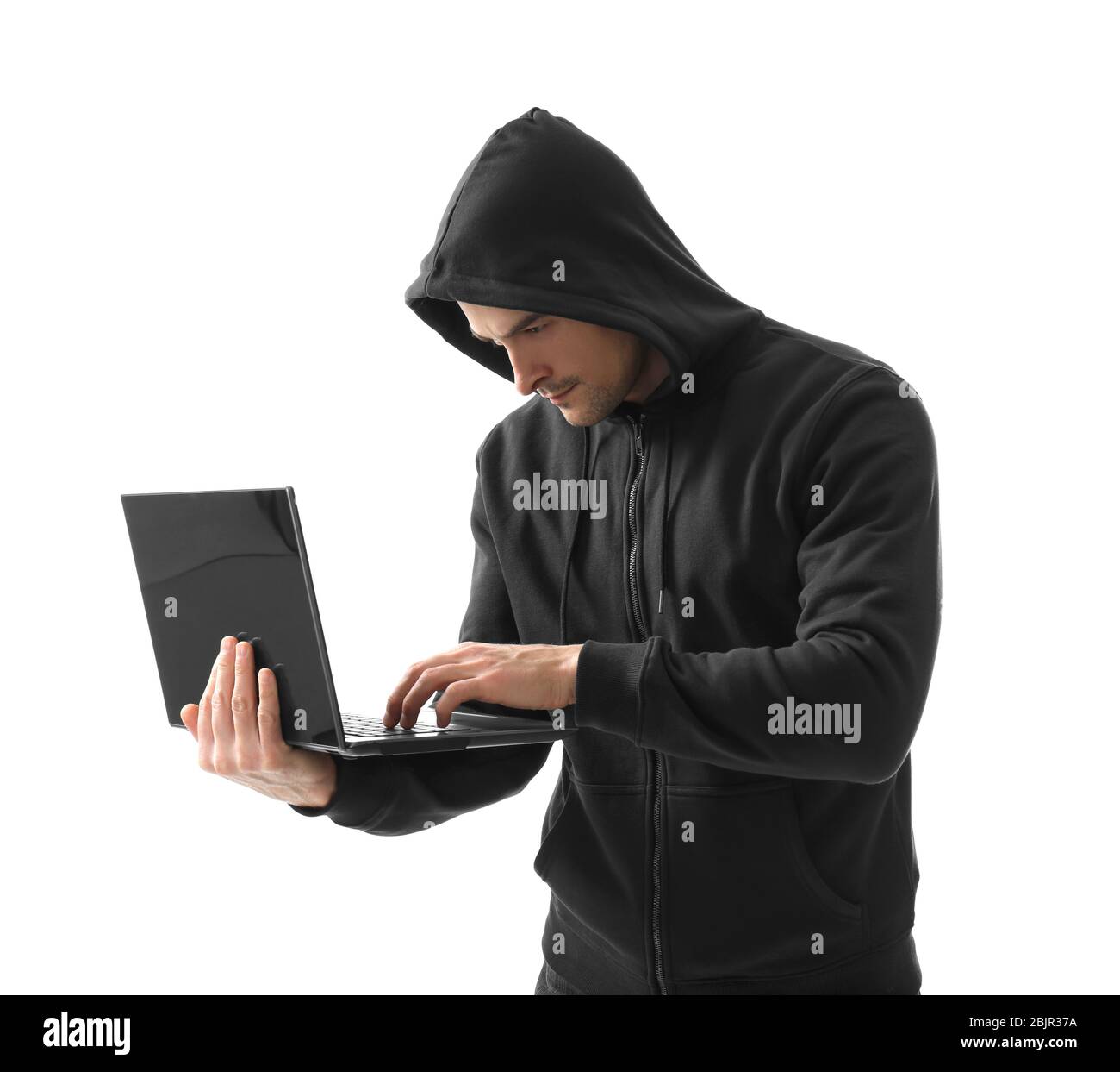 Professional hacker with laptop on white background Stock Photo - Alamy
