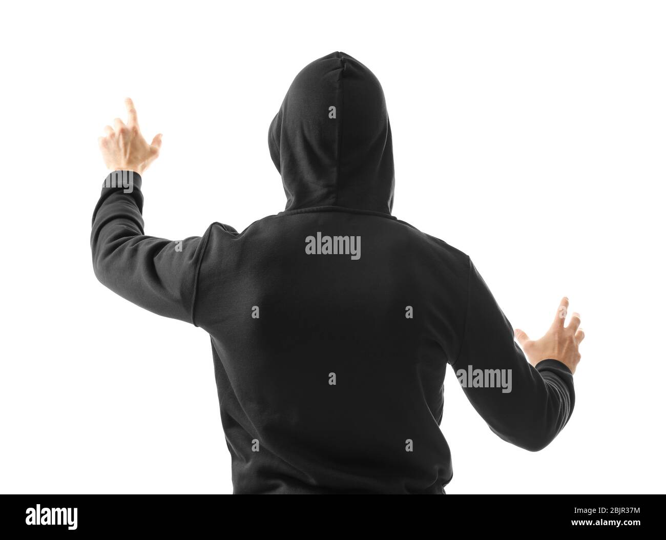 Hacker pushing button on virtual screen against white background Stock ...