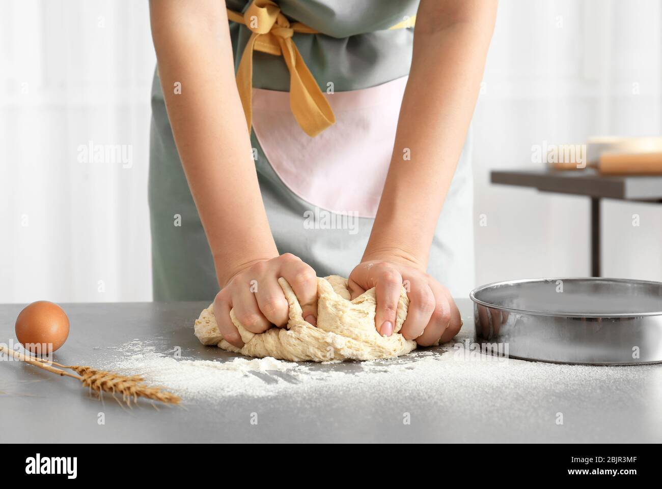 Woman kneading dough on hi-res stock photography and images - Alamy