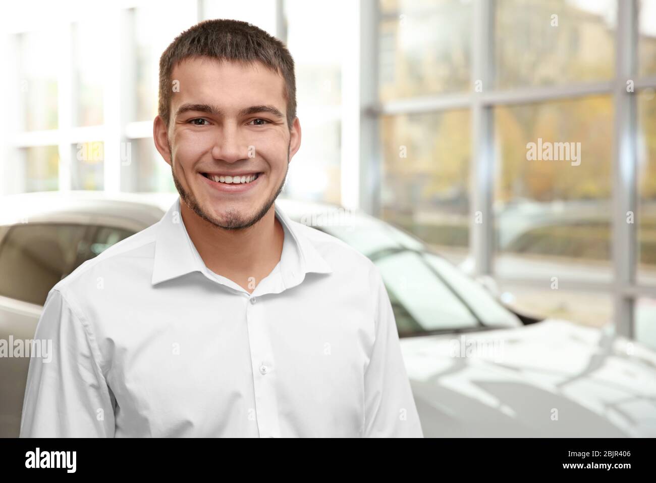 Car salesman in dealership hi-res stock photography and images - Alamy