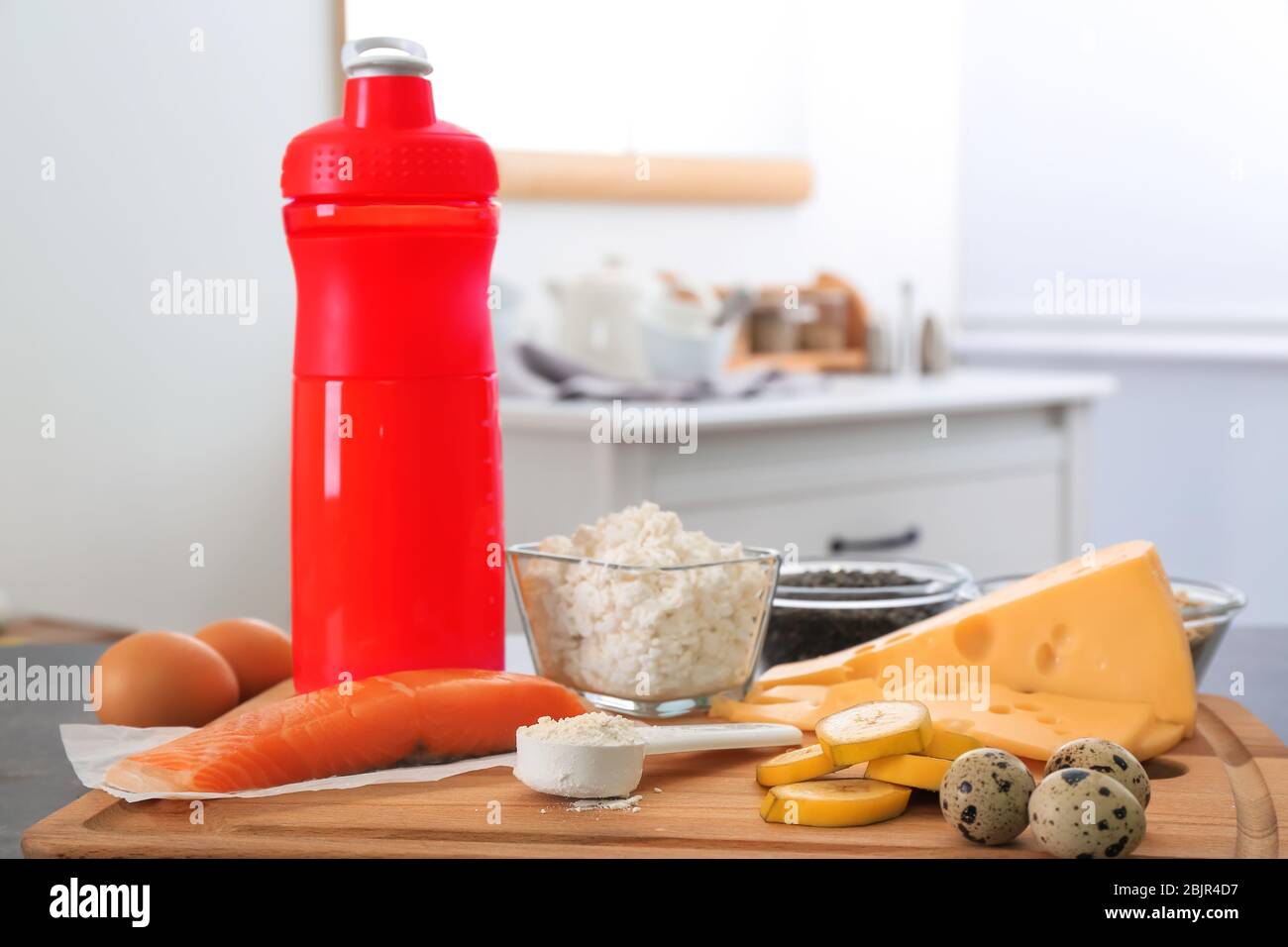 High protein food, powder and shake on table Stock Photo - Alamy