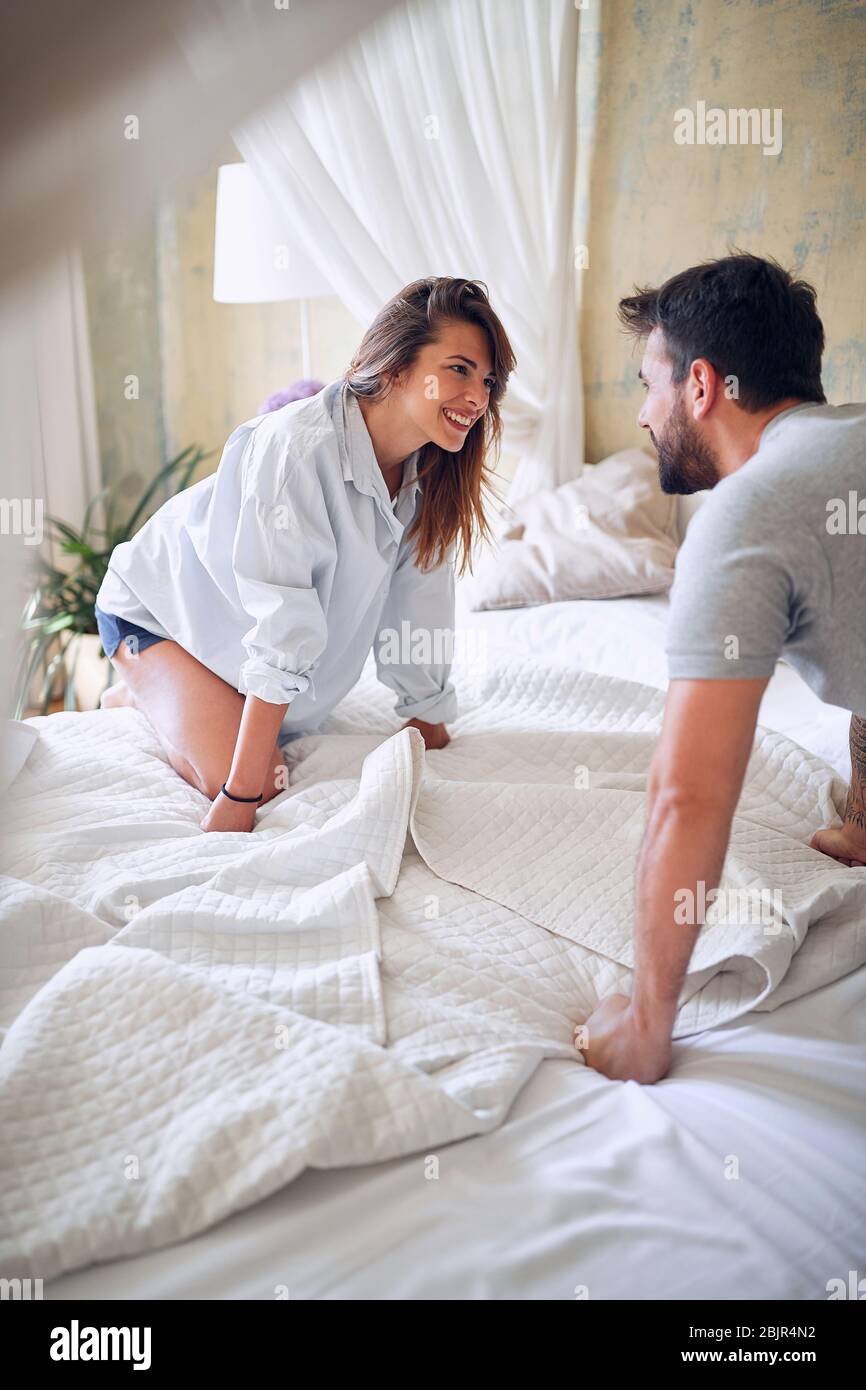 Happy couple enjoying intimate moment at morning in bed Stock Photo - Alamy