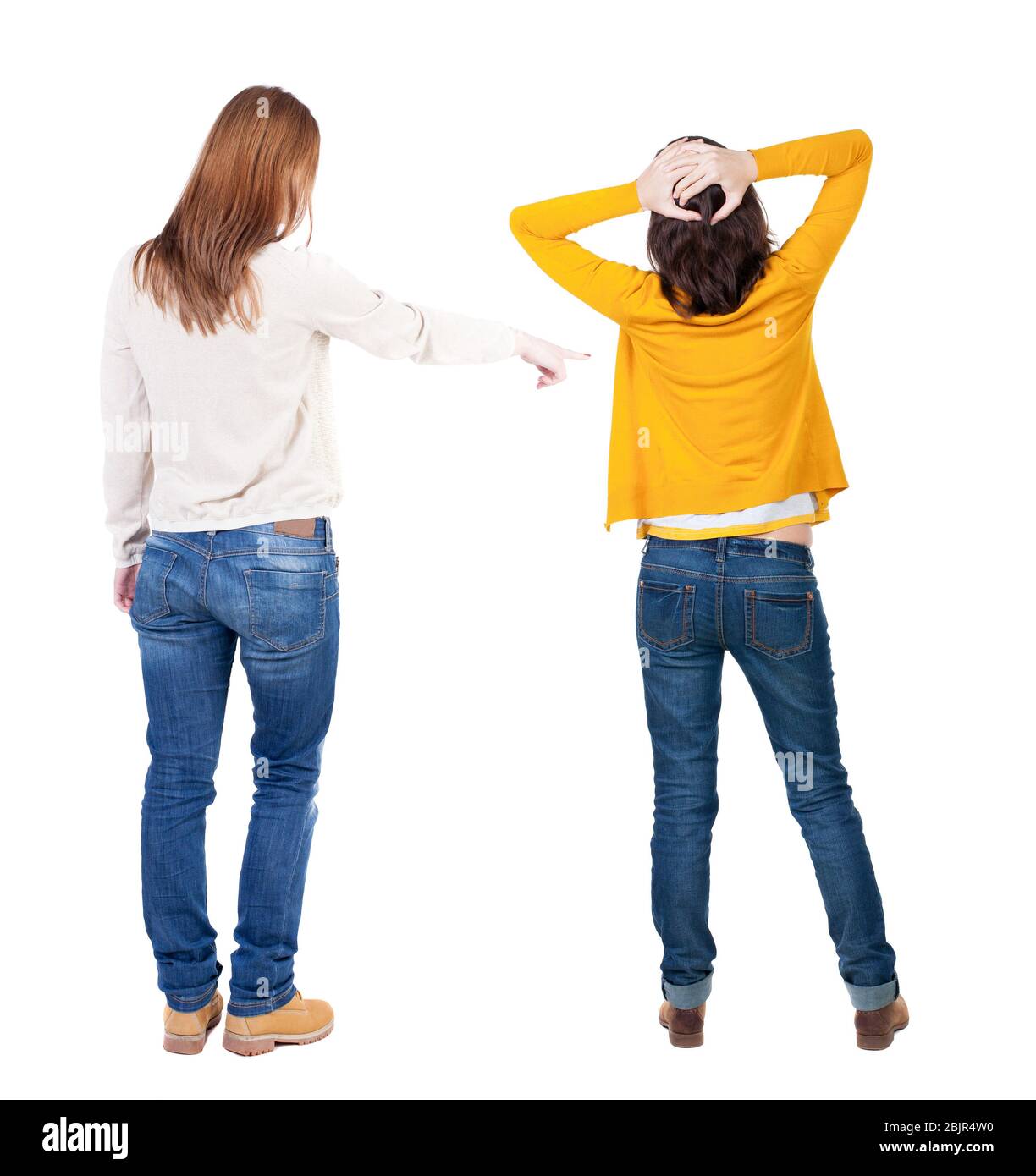 Back view of two pointing girl in sweater. Rear view people collection ...