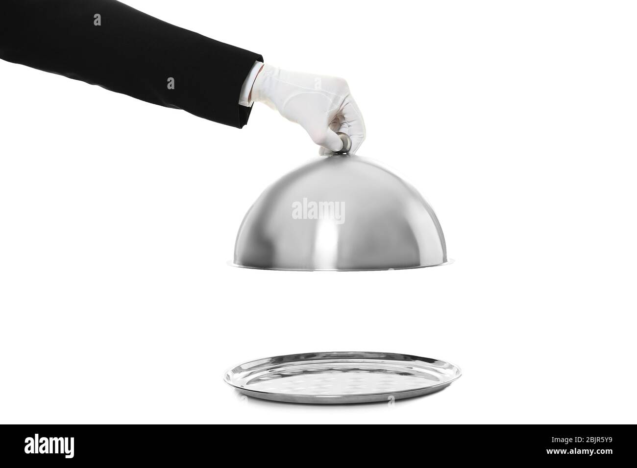 Waiter's hand holding cloche over tray against white background Stock ...
