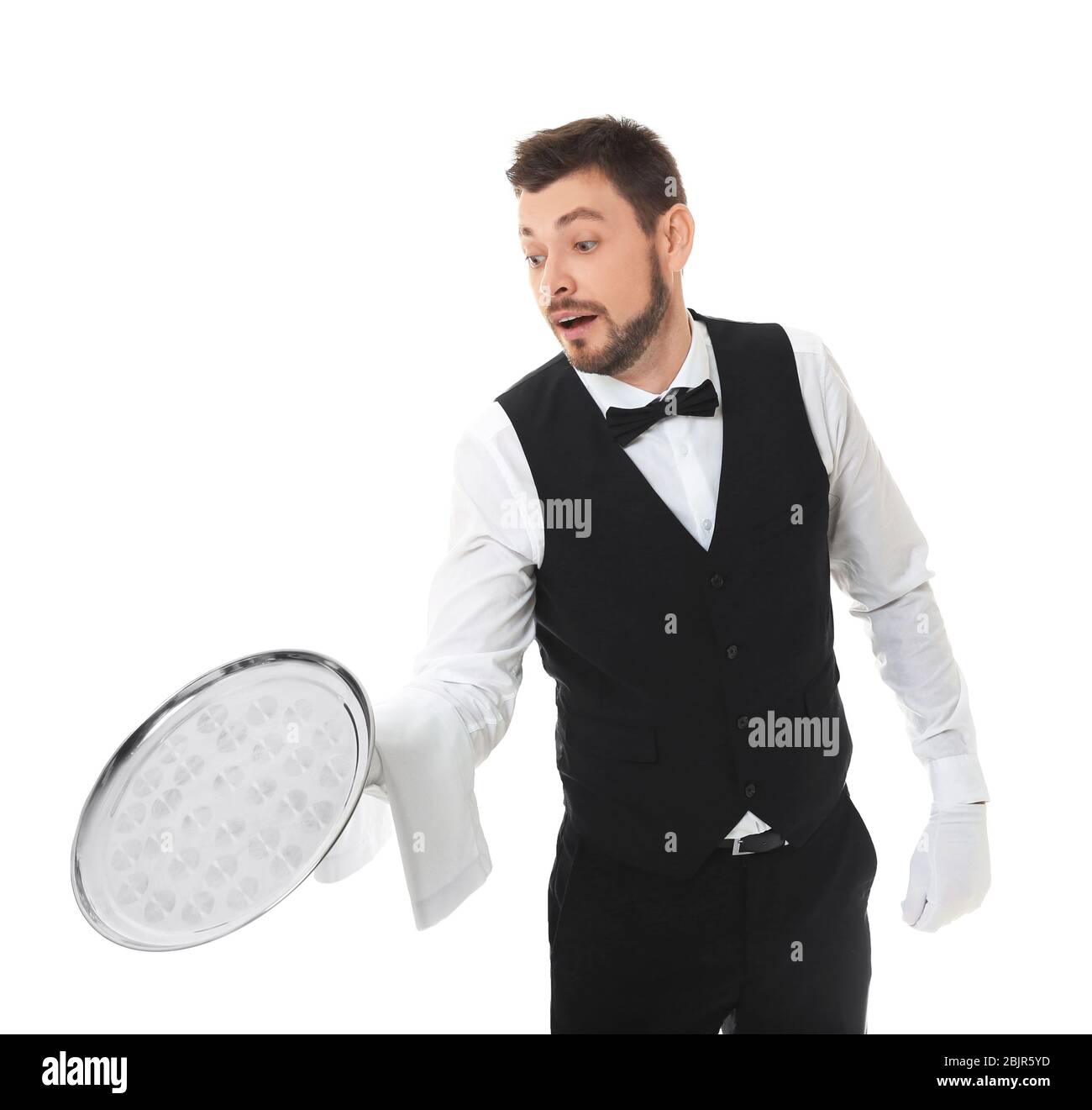 Waiter dropping empty tray against white background Stock Photo - Alamy