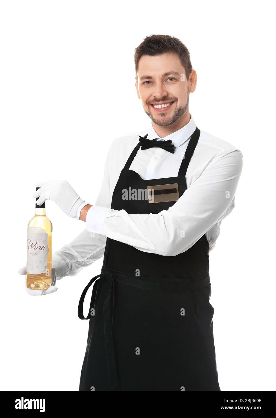 Handsome waiter with bottle of wine on white background Stock Photo - Alamy