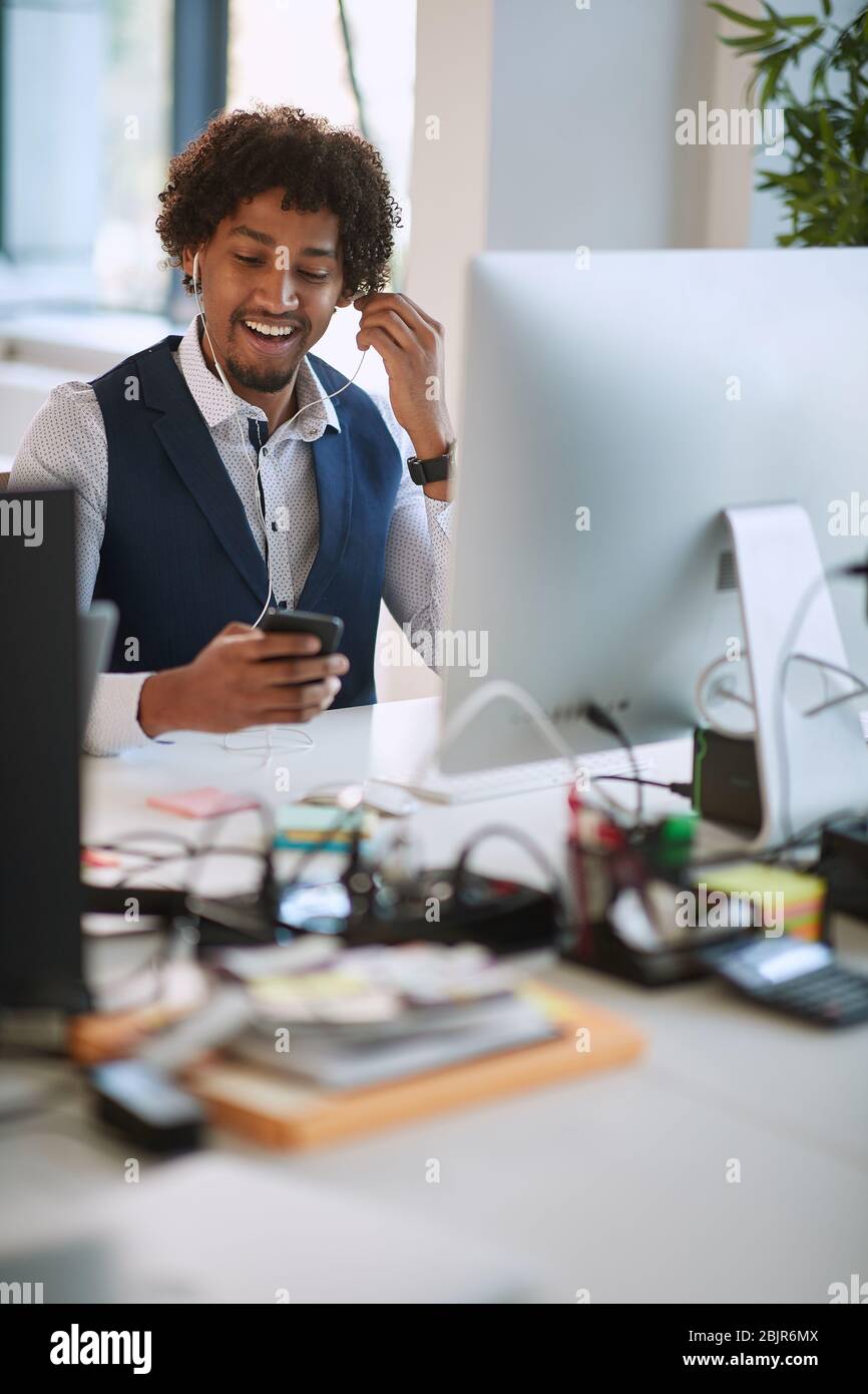 Working in the office, everything is better with music, sharp dressed ...