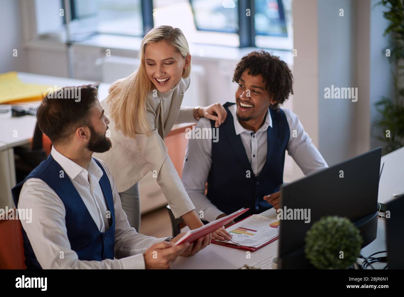 Team building at work is a must for a successful business, smiling ...