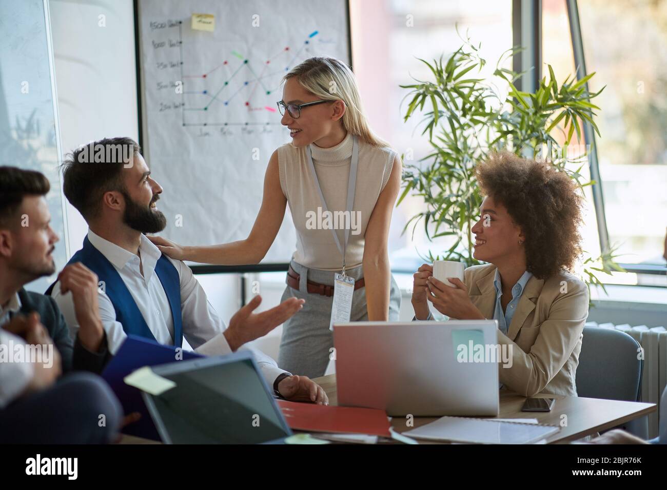 Cheering business man sitting laptop hi-res stock photography and ...