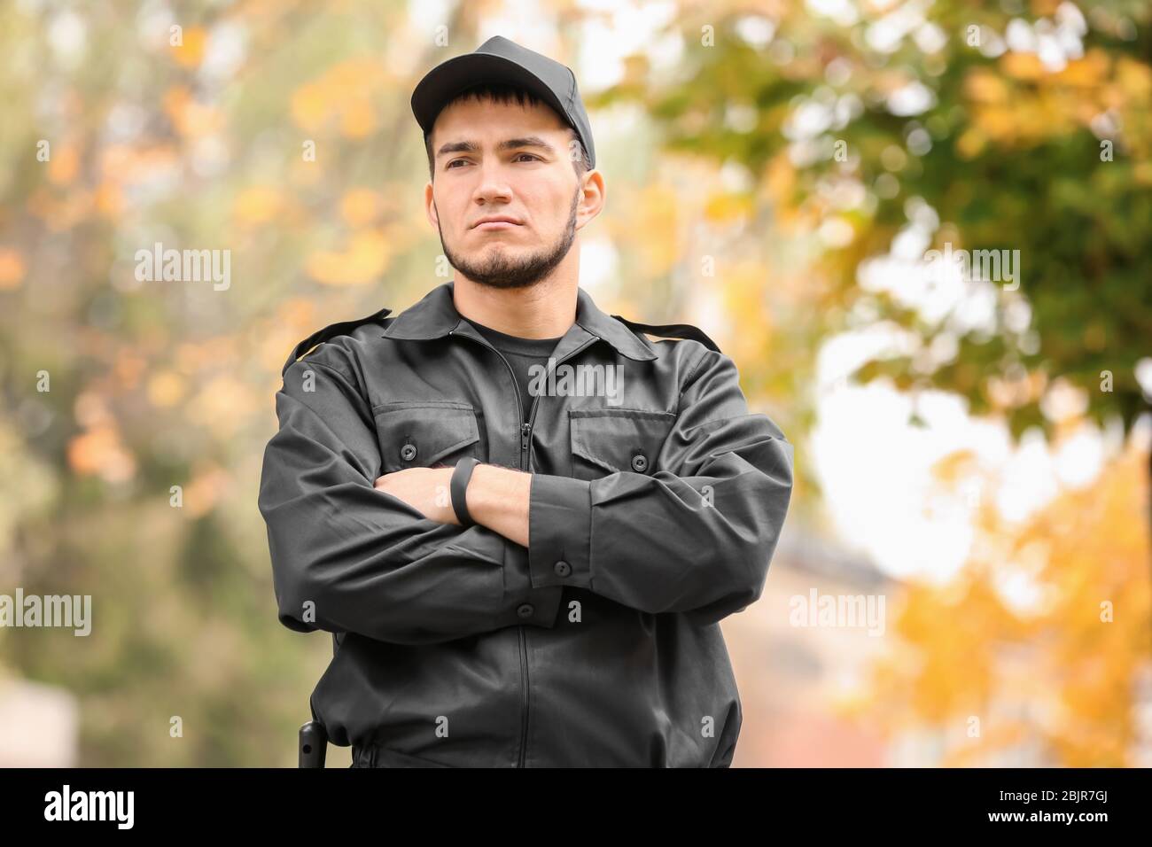 Male security guard outdoors Stock Photo - Alamy