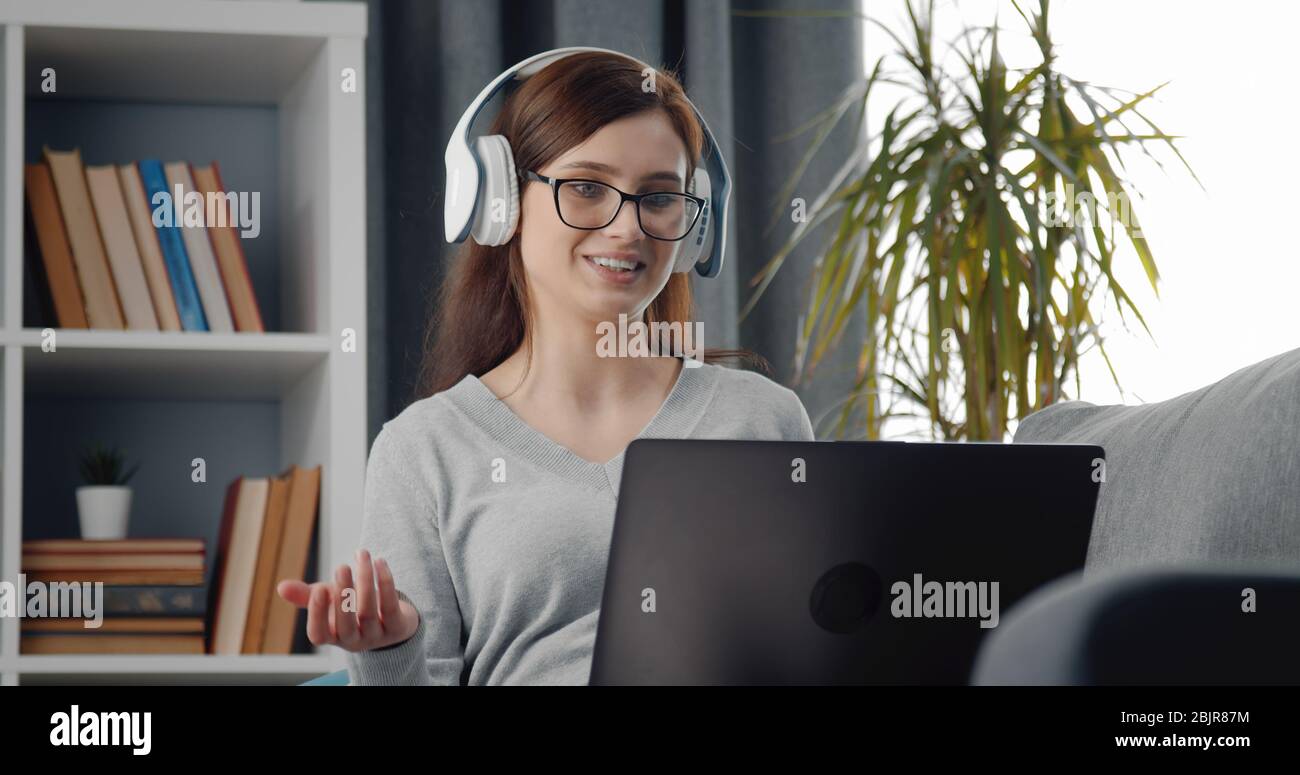 Brunette talking through internet Stock Photo - Alamy