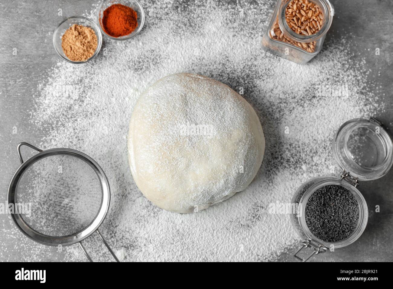 Raw puff pastry with flour on table Stock Photo - Alamy