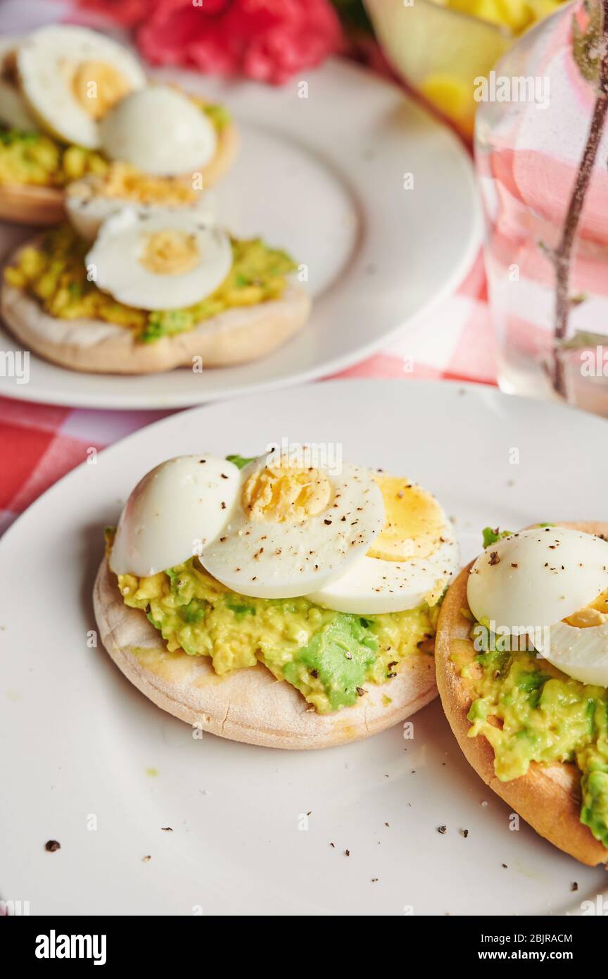 Morning breakfast background. Sandwich with eggs and avacado Stock ...