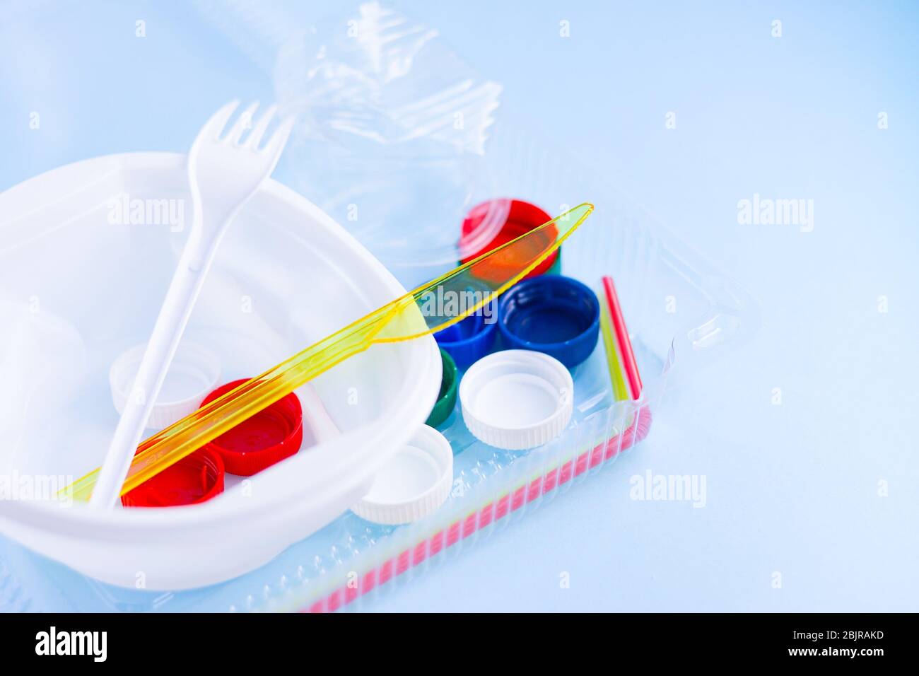 Pile of single use plastic garbage including water bottles, drinking ...