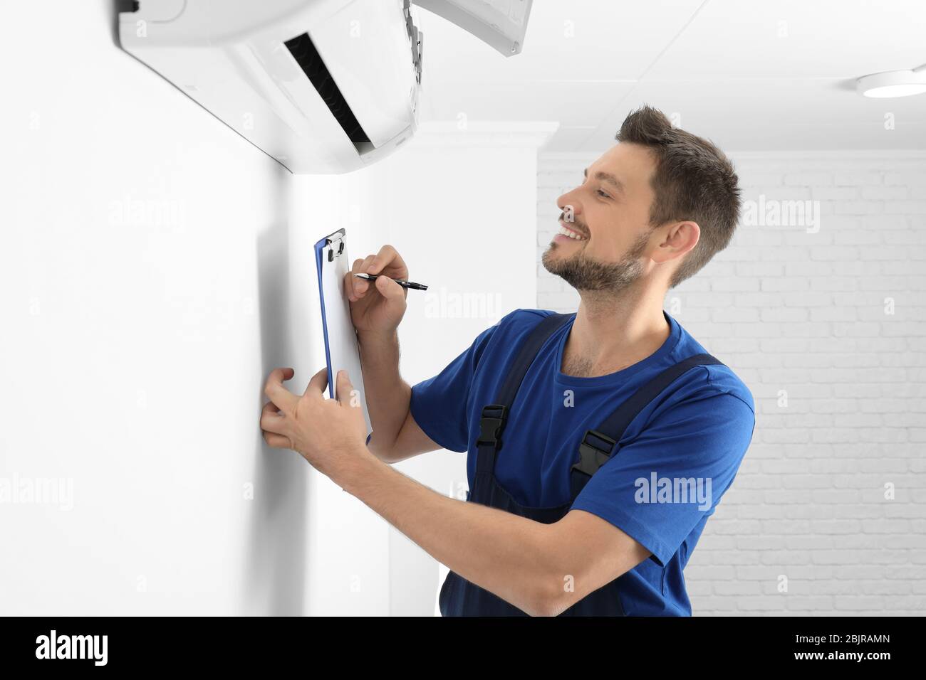 Checking air conditioner hi-res stock photography and images - Alamy