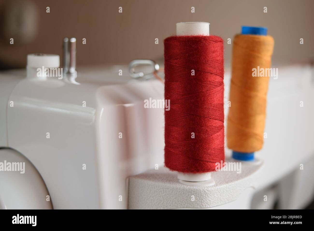 Thread coils hi-res stock photography and images - Alamy