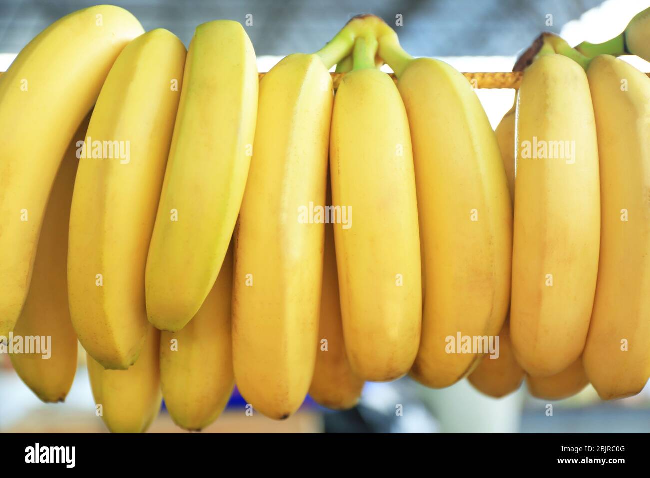 Fresh ripe bananas in supermarket, closeup Stock Photo - Alamy