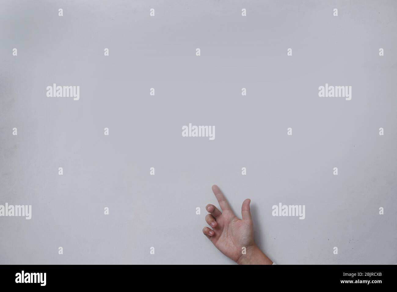 Teacher woman hand showing whiteboard in classroom Stock Photo - Alamy