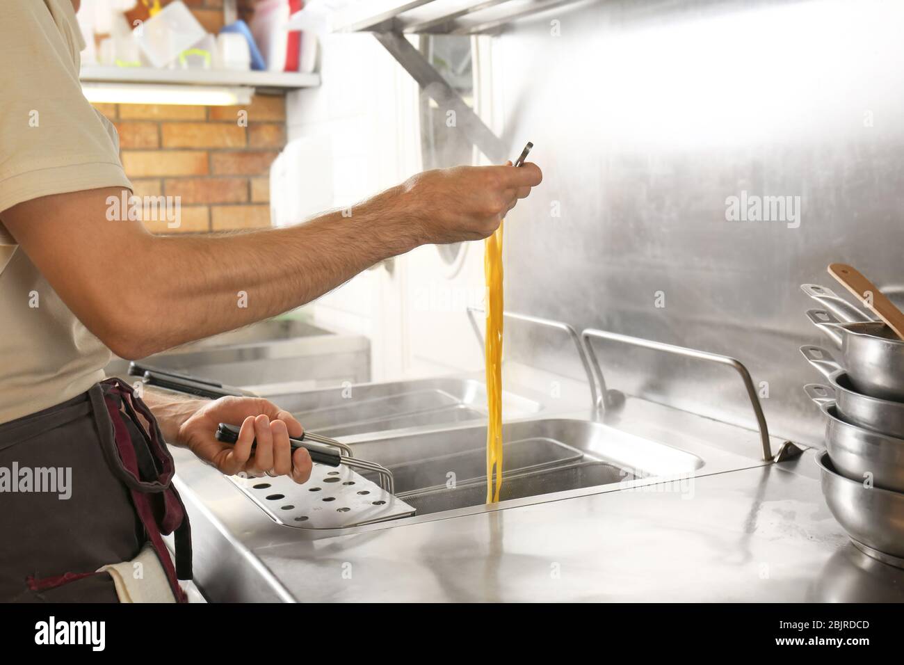Restaurant chef boiling pasta in hi-res stock photography and images ...