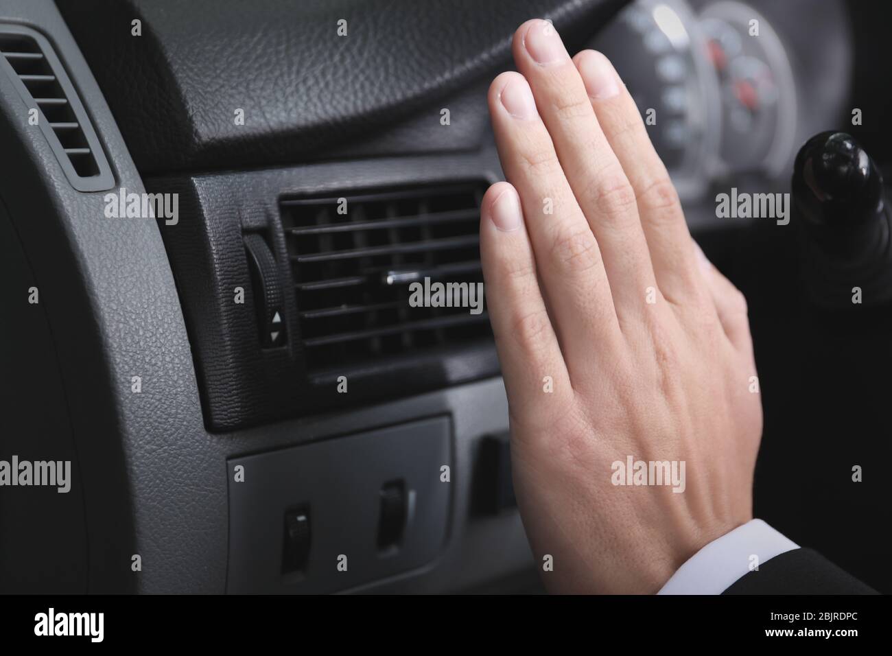 Man turning on car air hi-res stock photography and images - Alamy