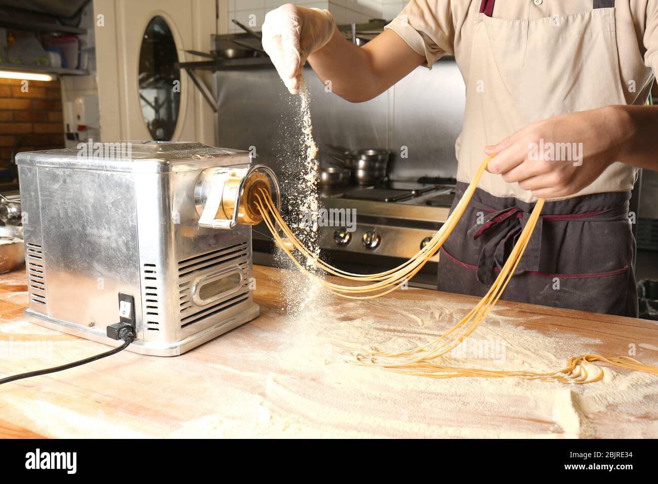 Male chef preparing pasta hi-res stock photography and images - Alamy