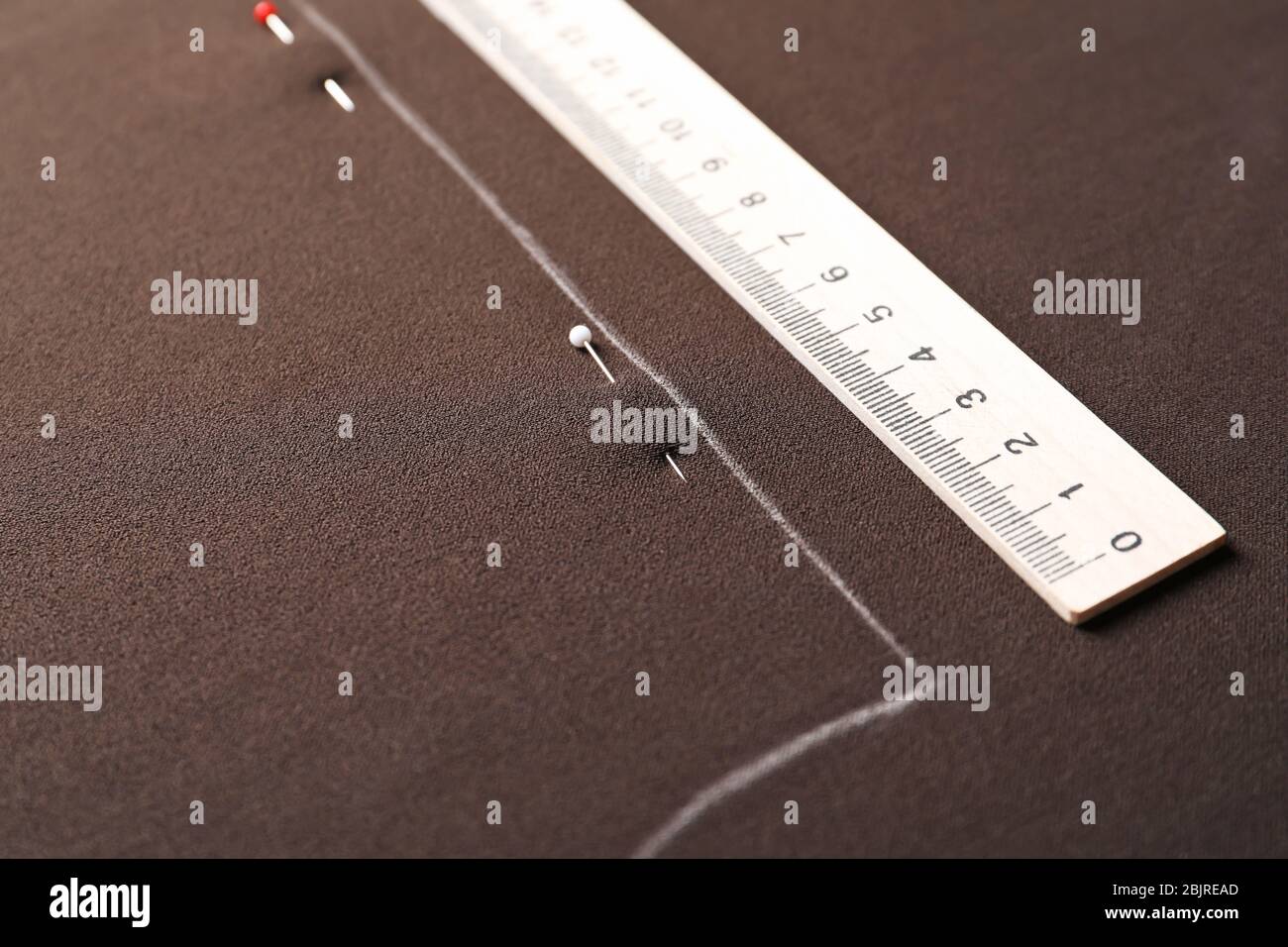 Fabric with pattern template and ruler, closeup Stock Photo - Alamy