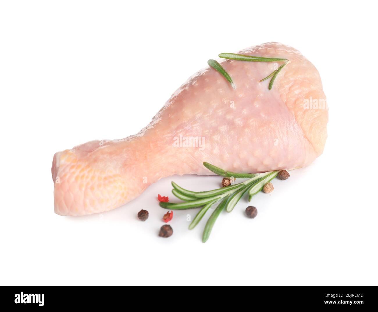 Raw chicken leg on white background Stock Photo - Alamy
