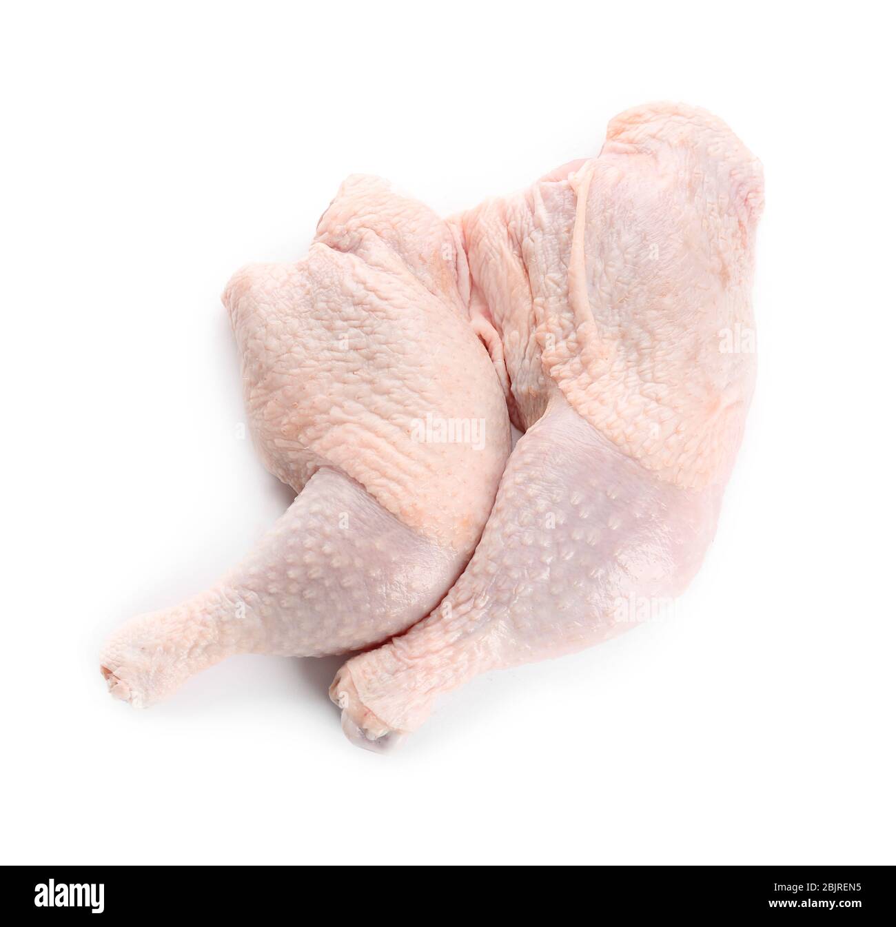 Raw chicken legs on white background Stock Photo - Alamy