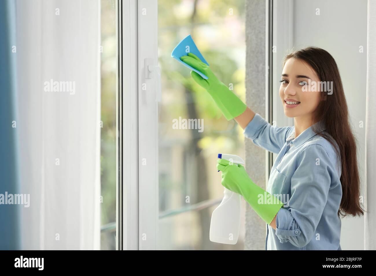 Emotional woman cleaning service hi-res stock photography and images ...