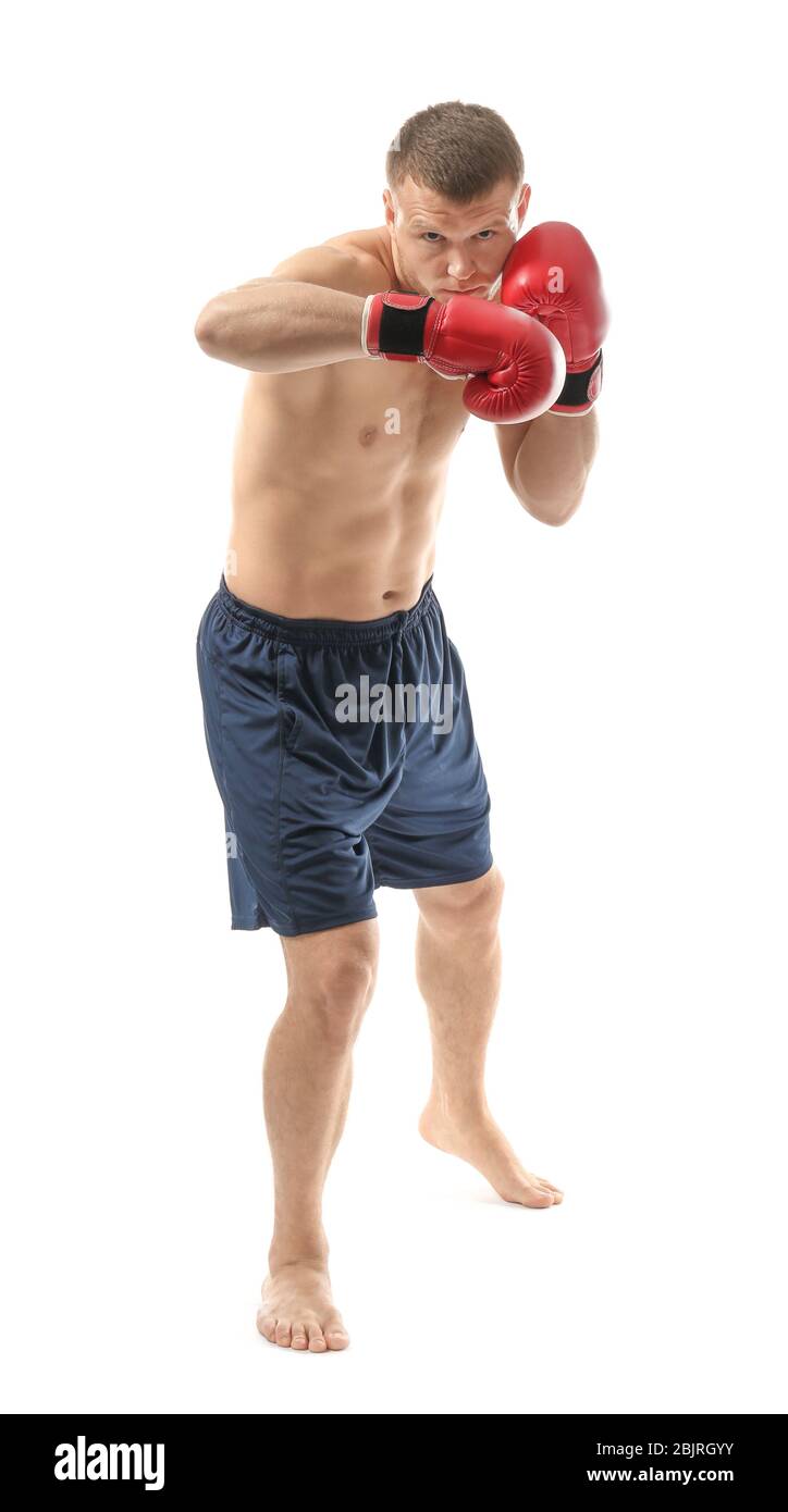 Attractive young boxer on white background Stock Photo - Alamy