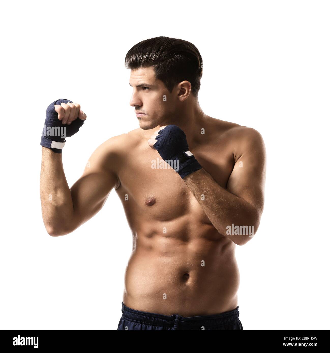 Attractive young boxer on white background Stock Photo - Alamy