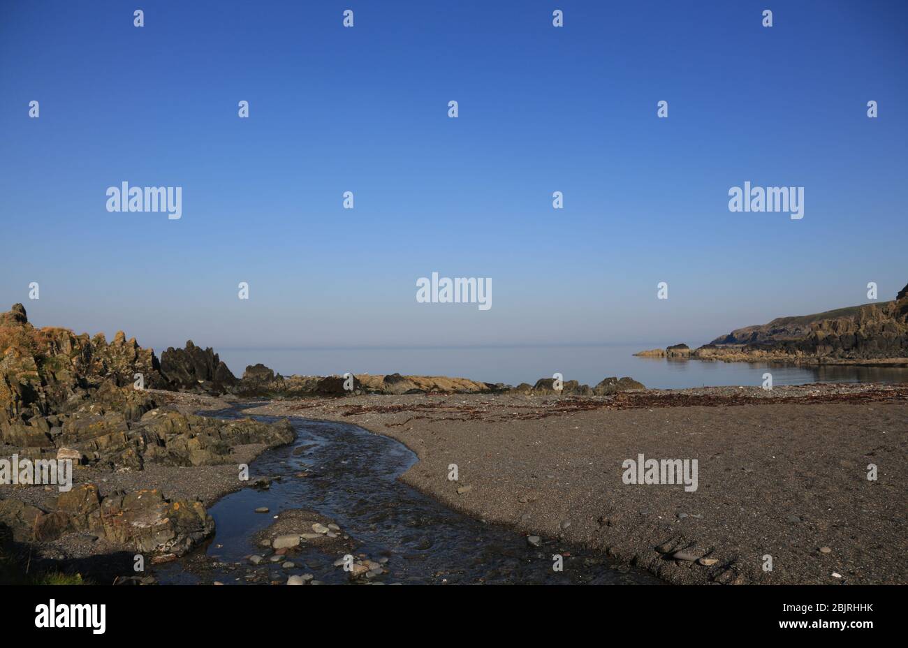 The beach at Port of Spittal bay, near Portpatrick, Dumfries and ...
