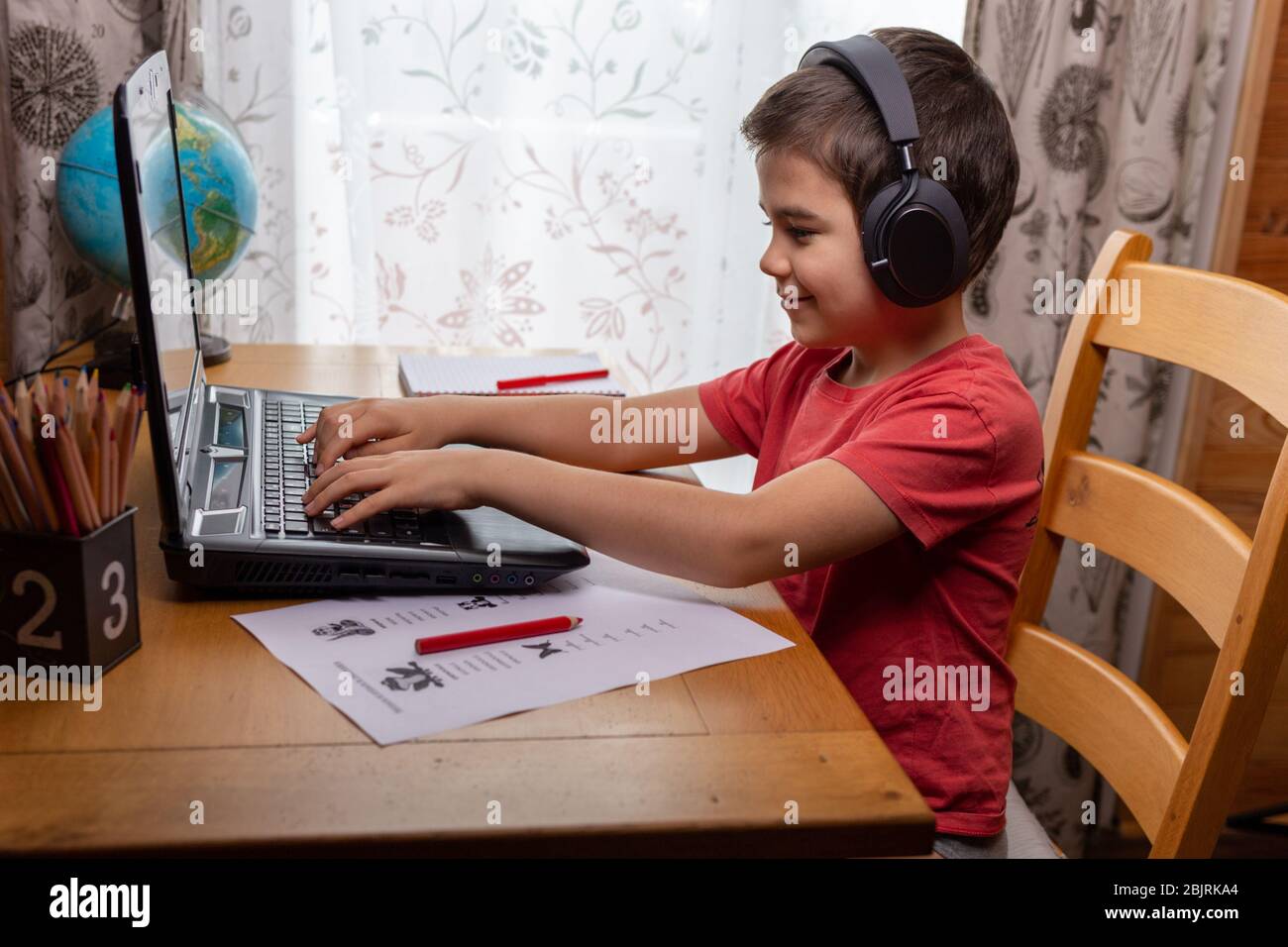 child studying from home. preschool kids with computer. distance online ...