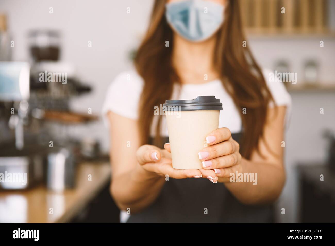 Business Owner Concept - Beautiful Caucasian Barista in face mask ...