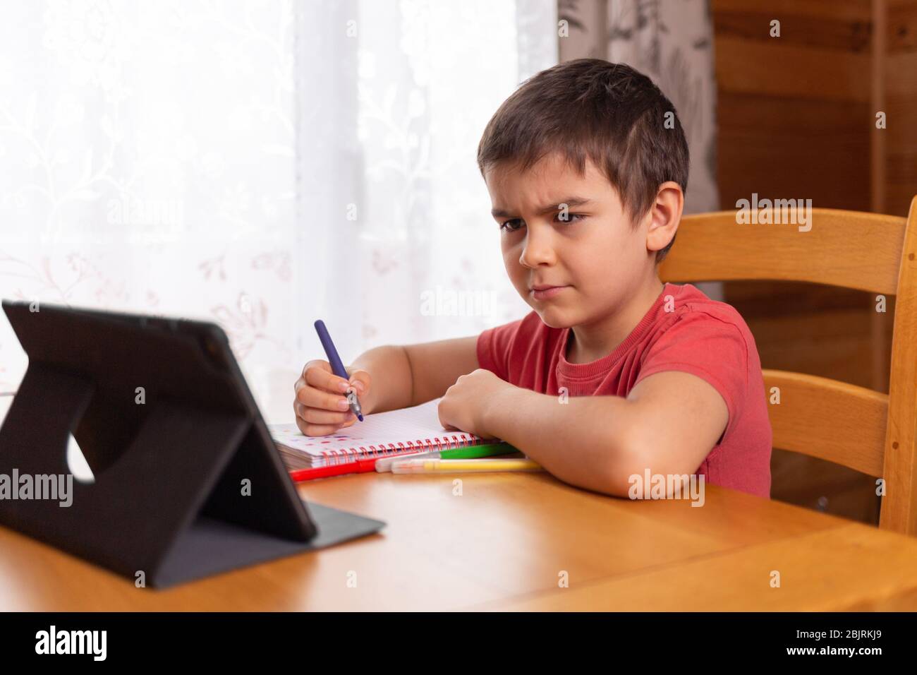 Online working kids hi-res stock photography and images - Alamy