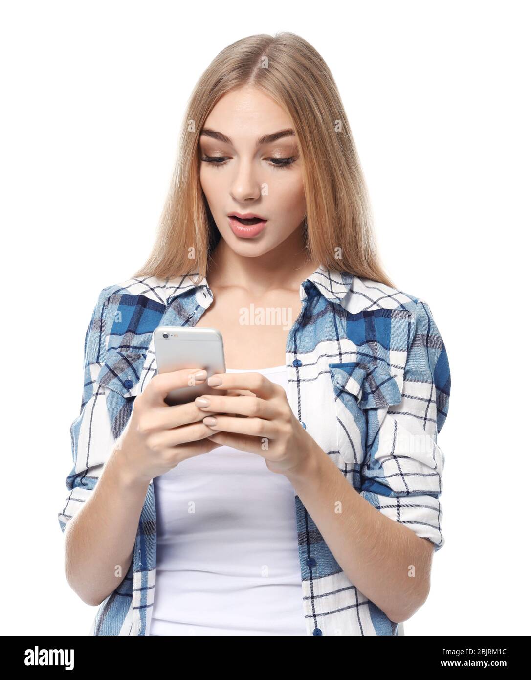 Beautiful young woman with mobile phone on white background Stock Photo ...