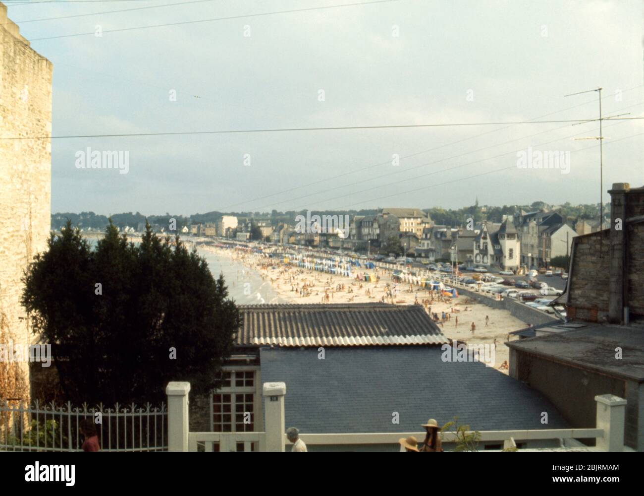 The view across the rooftops of holidaymakers on the beach at St Cast ...