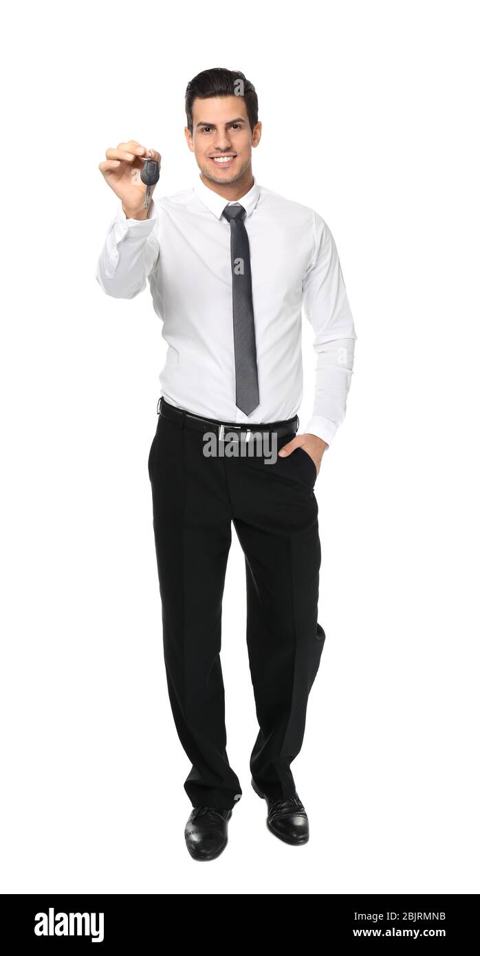 Salesman in formal clothes holding car key on white background Stock ...