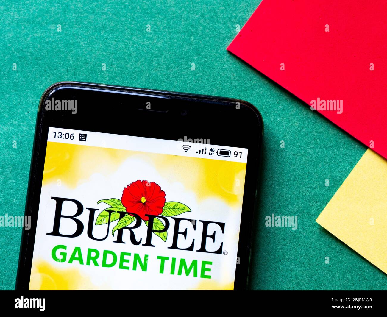 In this photo illustration a Burpee Gardening logo seen displayed on a ...