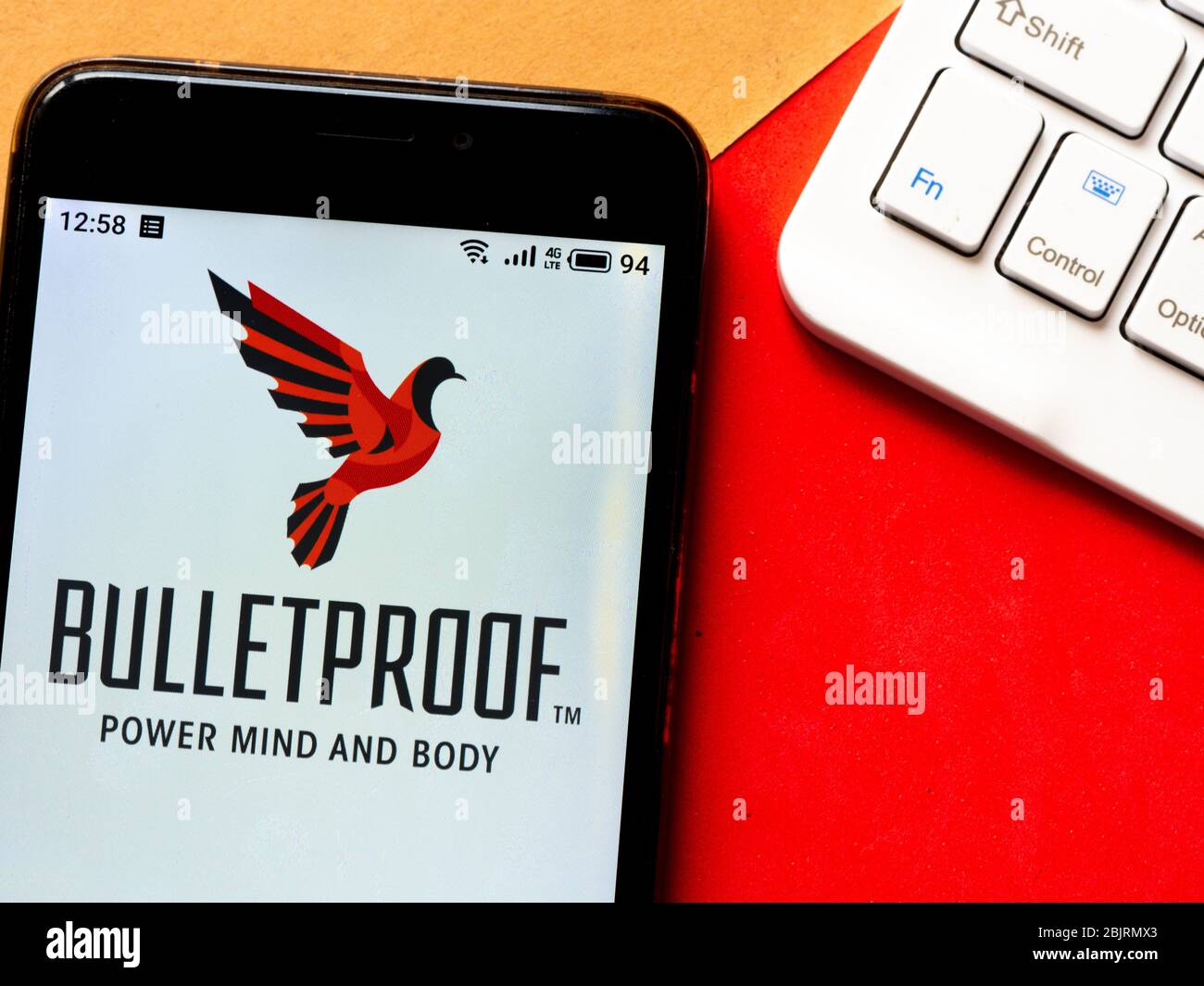 In this photo illustration a Bulletproof logo seen displayed on a ...