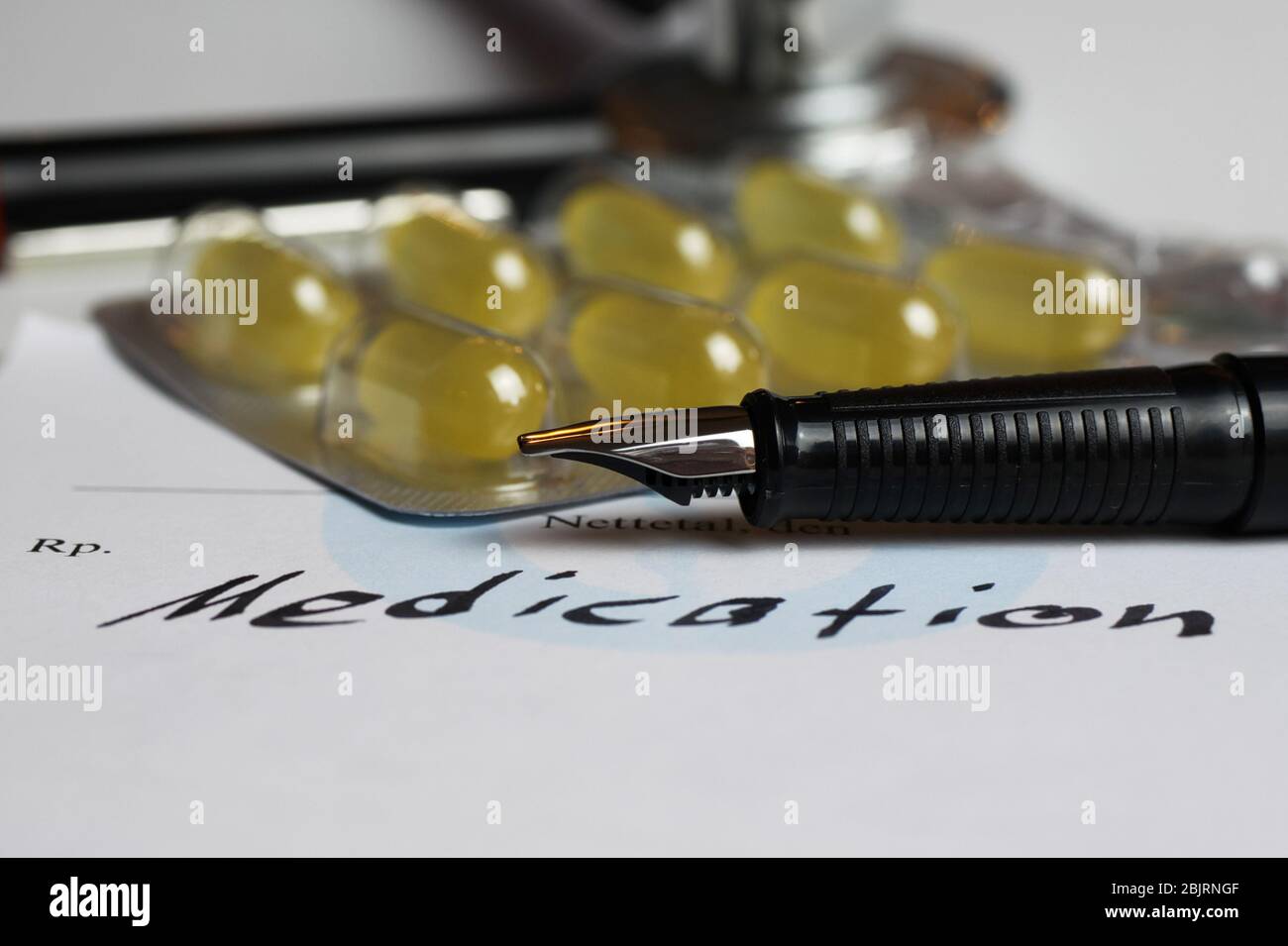 Macro closeup of isolated white prescription note, handwritten word ...